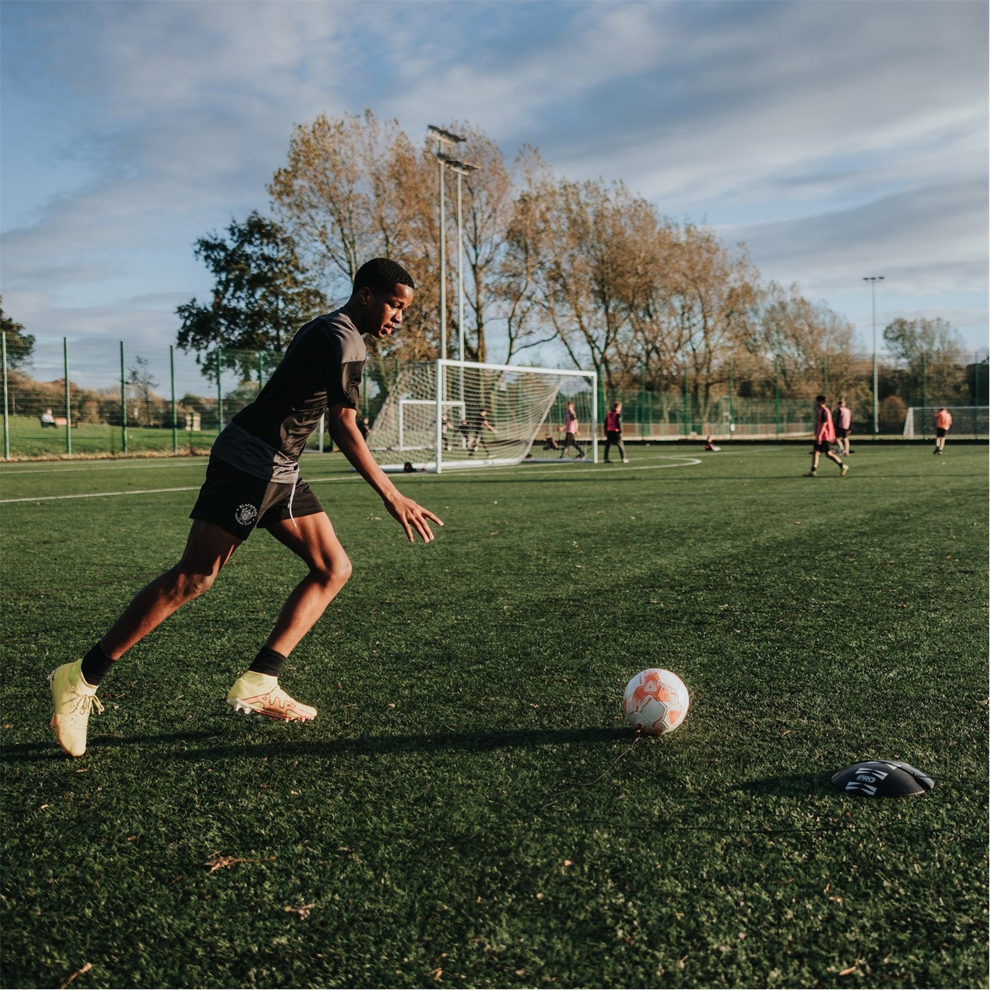 Football Flick | PRO Return Ball | Black & Orange | SportsDirect.com